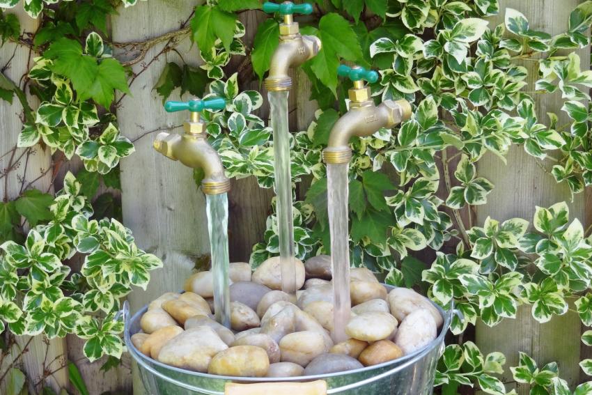 7 Ideas for DIY Upcycled Water Features for Your Garden | LoveToKnow