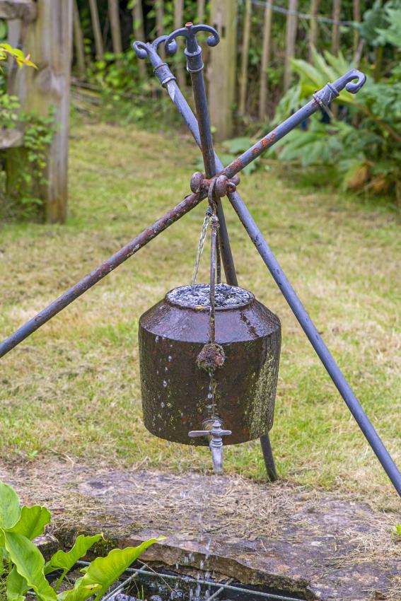 7 Ideas for DIY Upcycled Water Features for Your Garden | LoveToKnow