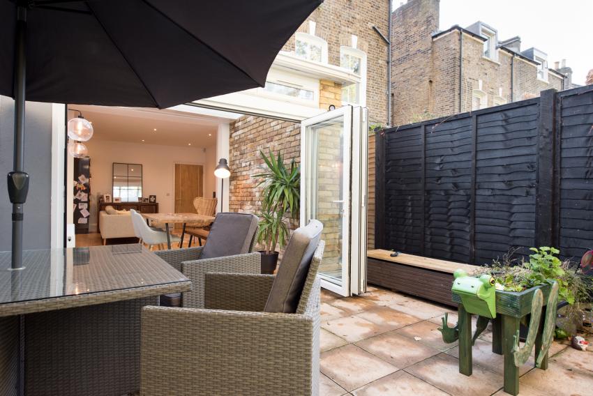 26 Wood Slat Wall Ideas for a Modern Home Interior or Exterior | LoveToKnow